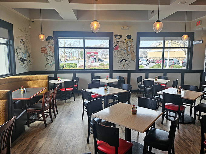 The dining room balances modern touches with deli tradition, where pendant lights cast a warm glow over conversations and corned beef.