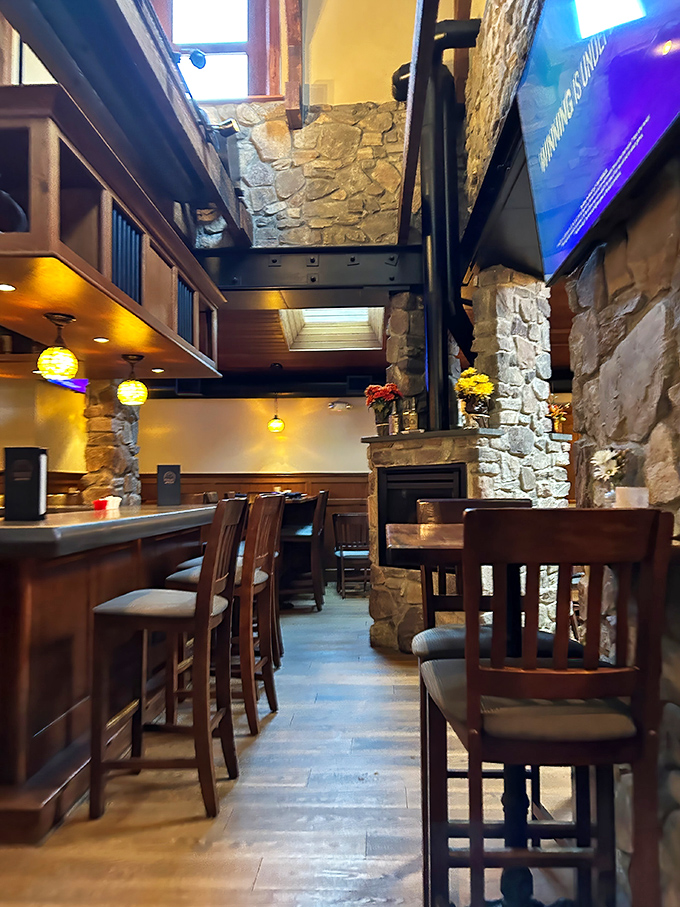 Stone walls and warm lighting create a tavern atmosphere where colonial charm meets modern comfort. George Washington would approve.