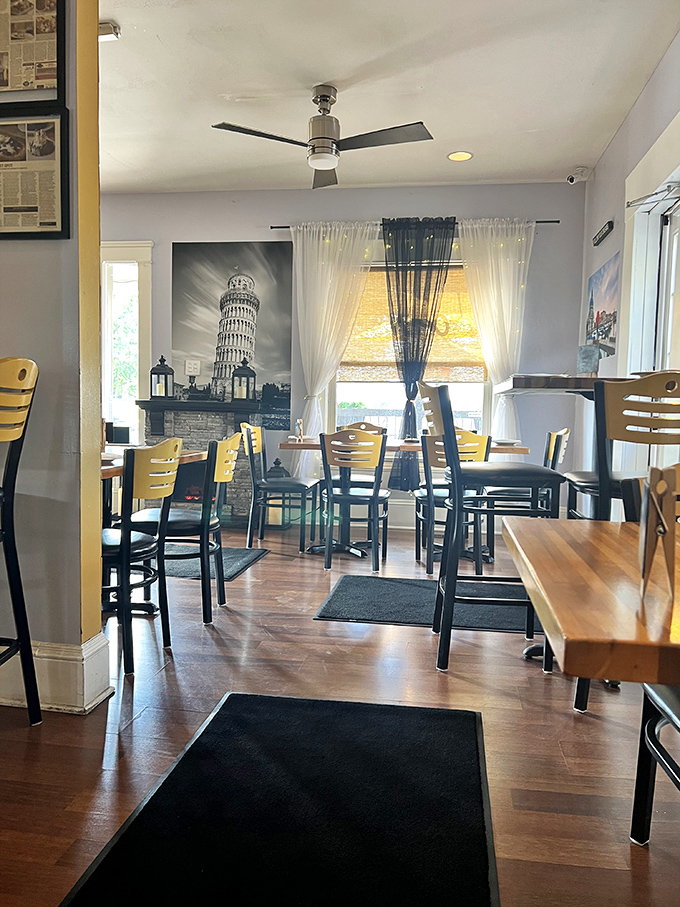 A mural of the Leaning Tower of Pisa watches over diners, as if to say, "You too will be leaning after this feast."