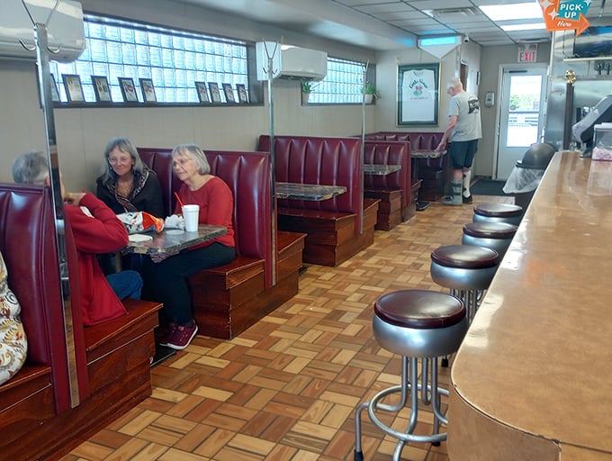 Red vinyl booths and counter stools tell stories of countless conversations, first dates, and food epiphanies that have unfolded here.