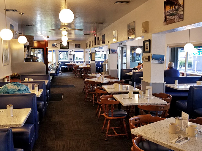 The dining room hums with conversation and clinking silverware&mdash;a symphony of satisfaction orchestrated by hungry patrons.