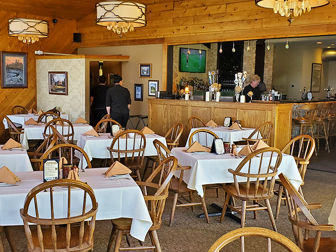 Windsor chairs and white tablecloths create that perfect "fancy but not intimidating" vibe where both grandma and hipsters feel at home.
