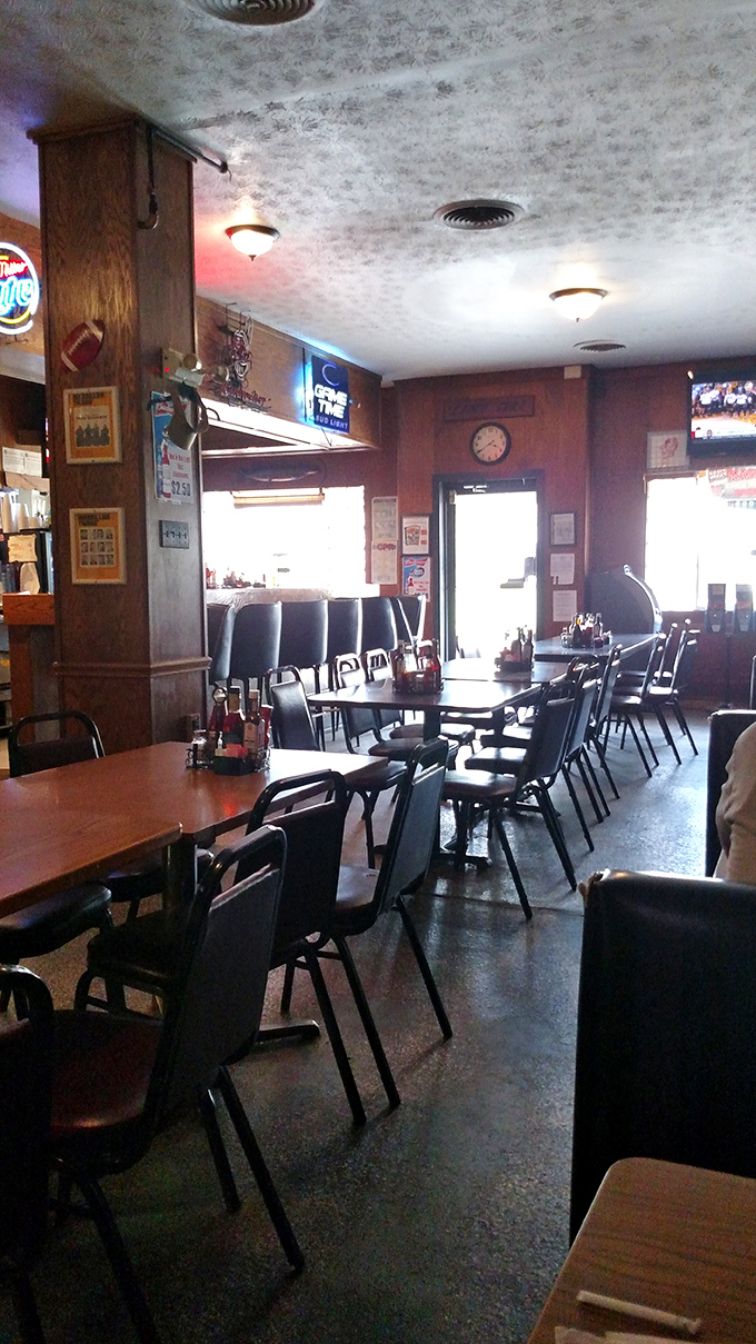 Classic diner seating where every booth has witnessed a thousand perfect meal moments.