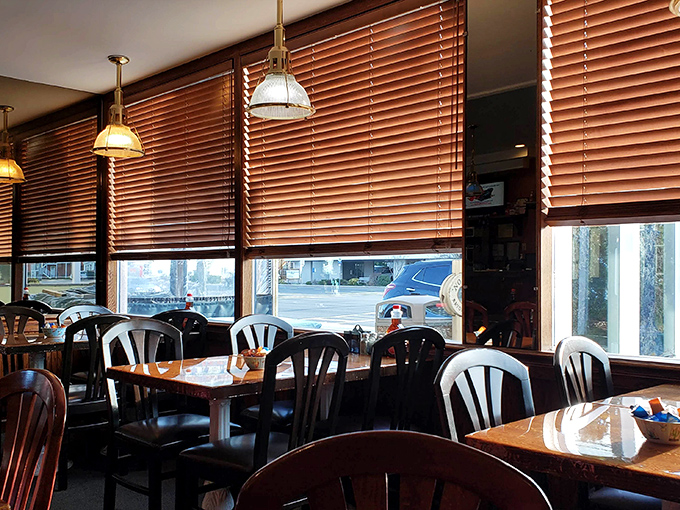 Morning light filters through wooden blinds, creating that perfect "let's linger over coffee and conversation" atmosphere.