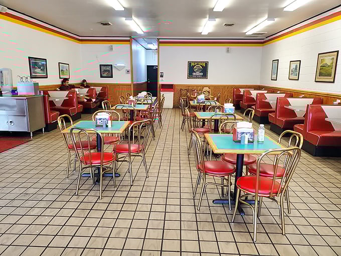 The dining room hasn't changed in decades because perfection doesn't need updating &ndash; just those green tables and red booths telling stories.