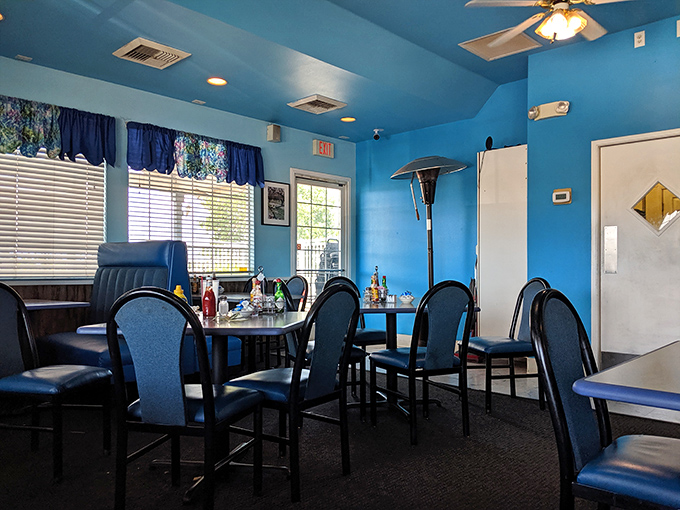 The dining area's blue theme continues with comfortable seating that invites you to linger over that second (or third) cup of coffee.