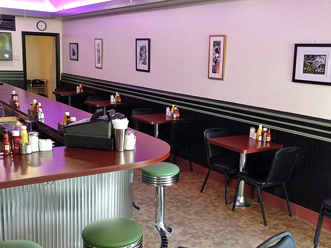 The dining area balances comfort with efficiency&mdash;where conversations flow as freely as the coffee. Those booths have heard decades of morning stories.