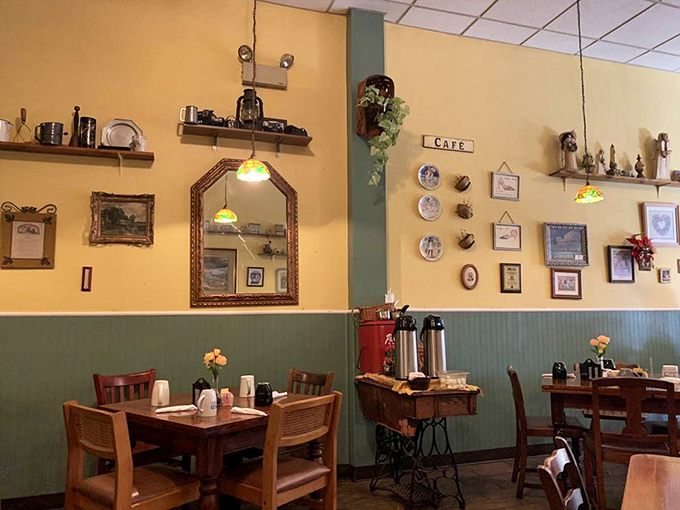 Two-tone walls, vintage d&eacute;cor, and wooden tables create that "been here forever" charm that chain restaurants spend millions trying to fake.