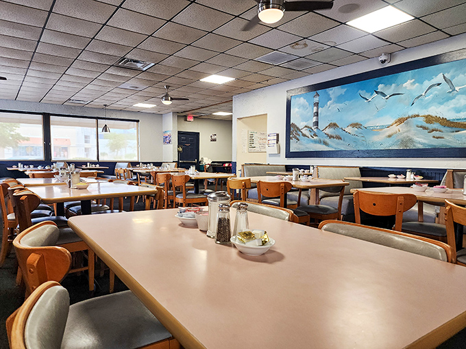 Tables filled with the universal language of contentment &ndash; the quiet concentration of people attacking serious breakfast plates.