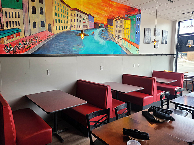 The vibrant mural transforms simple dining booths into something special. It's like eating in Italy, if Italy were designed by someone who really gets Ohio.
