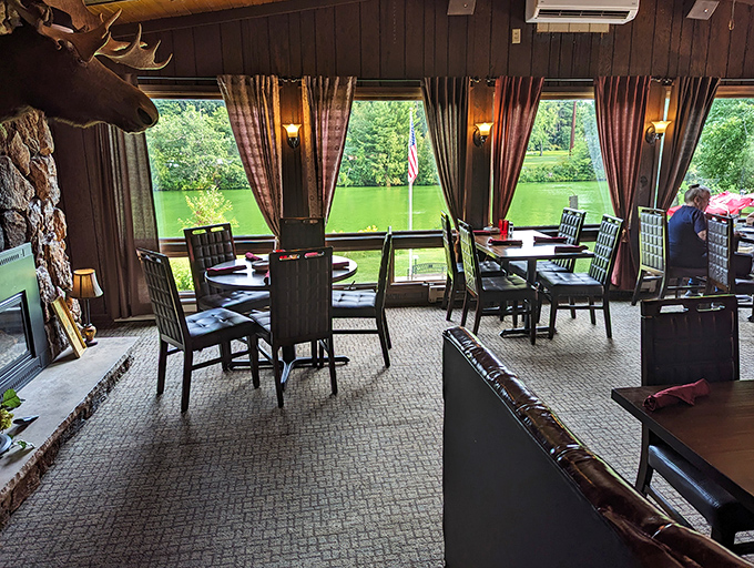 The dining room's wall of windows transforms every meal into dinner theater where Tainter Lake provides the ever-changing backdrop to your prime rib performance.