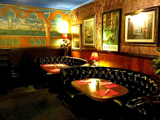 The dining area feels like a movie set where The Godfather meets Mad Men – red leather booths under moody lighting set the stage for memorable meals.