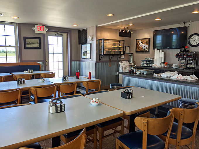 Simple tables, wooden chairs, and the promise of good food—a dining room where memories are made between bites of comfort classics.