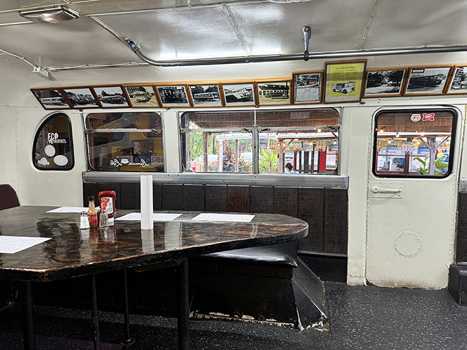 Dining in what appears to be a repurposed train car—because at Mike's Place, even the seating has a backstory.