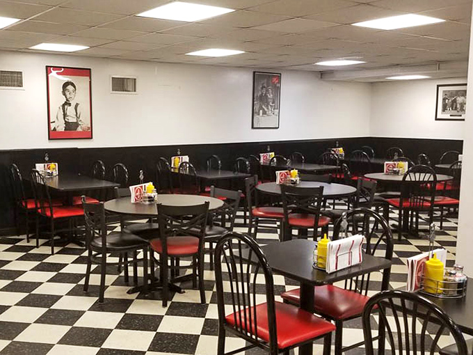 The dining room waits patiently between rushes, each table ready to host the next sandwich love affair.