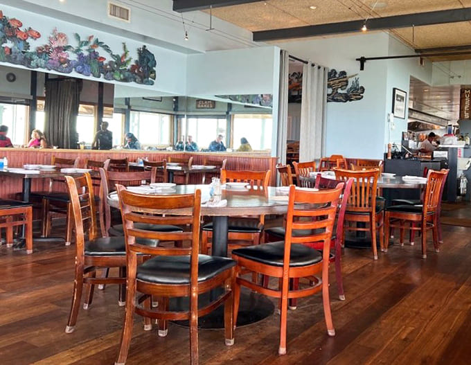 Wooden chairs, ocean views, and the promise of seafood—some dining rooms don't need chandeliers to feel luxurious.