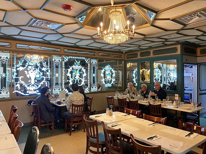 Where etched glass meets vintage charm, creating a dining room that feels like stepping into old Havana.