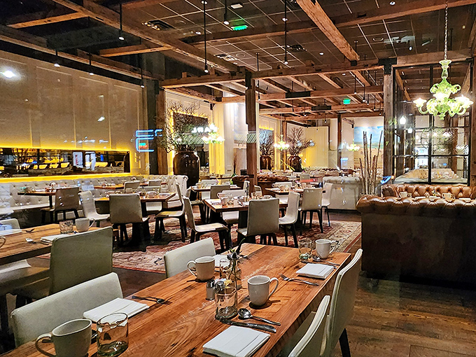 Morning light streams through windows, illuminating wooden tables set for breakfast. Even empty, the room hums with anticipation of meals to come. 