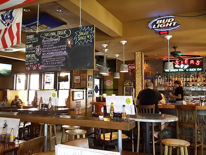 The bar area buzzes with energy as regulars chat with bartenders who remember not just your order but your stories too.