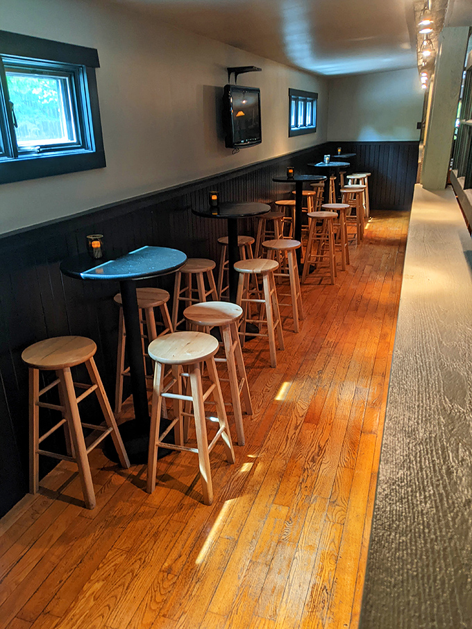 The high-top seating area offers a more casual vibe, perfect for those "I'm just stopping in for a quick bite" evenings that turn into three-hour conversations.