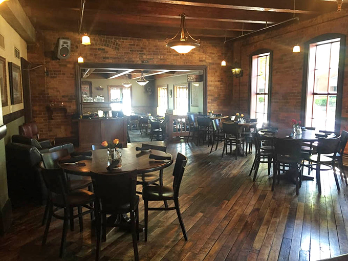 Sunlight streams through windows onto polished wooden floors, creating the perfect backdrop for memorable meals and conversations.