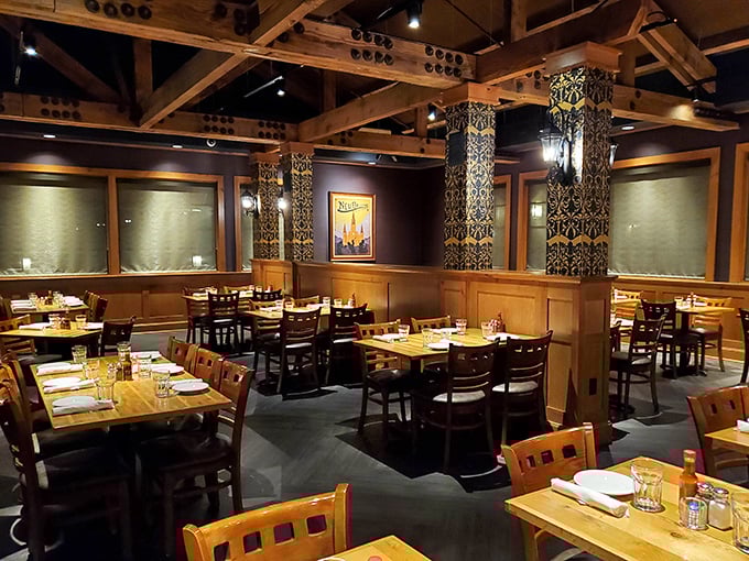 Exposed beams and warm lighting create a dining room where you'll want to linger long after your plate is clean.