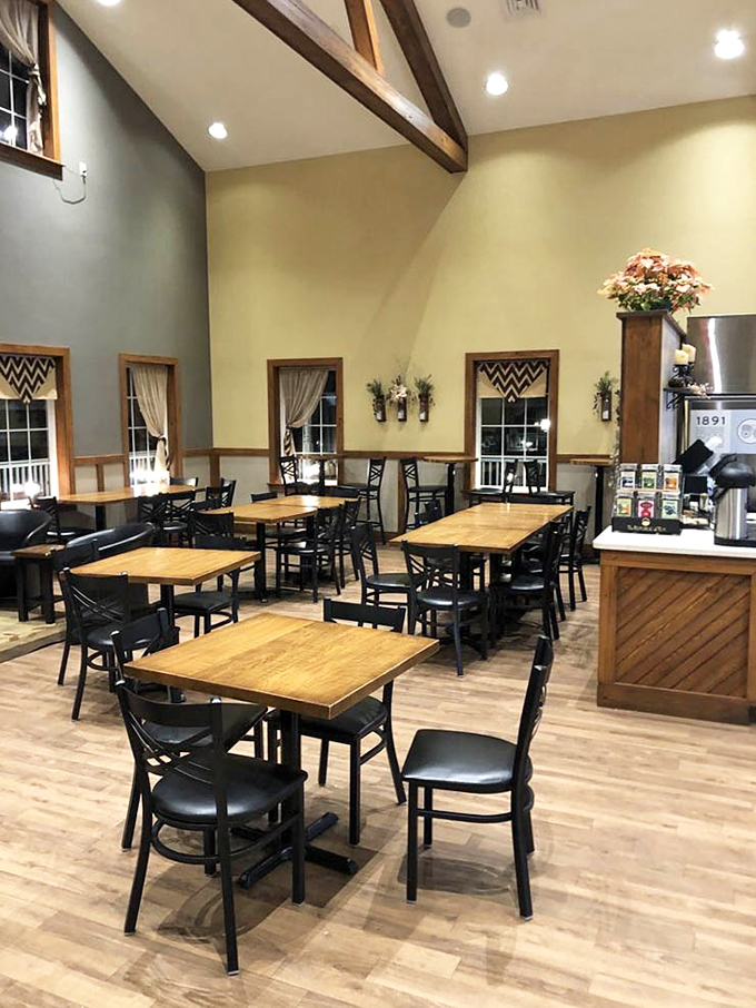 Vaulted ceilings and wooden beams create a dining space that feels both rustic and refined &ndash; like a barn that went to finishing school.