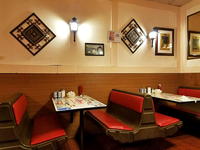 The wall art says "diner," but those red booths say "you're about to have the kind of meal worth driving across town for."