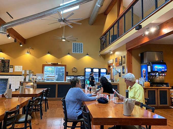 High ceilings, wooden beams, and that mezzanine level give this barbecue joint an unexpected touch of spaciousness&mdash;because good smoke needs room to be appreciated.