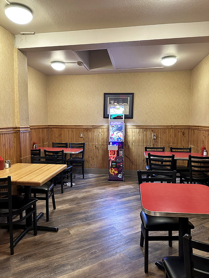 Wood paneling and simple tables create that rare atmosphere where both truckers and tech workers feel equally at home.