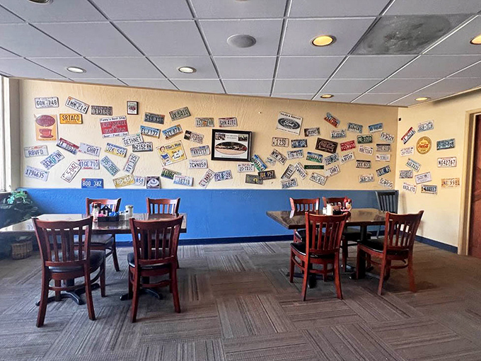 The license plate wall gives diners something to ponder between bites: "Where have all these travelers been before landing here?"