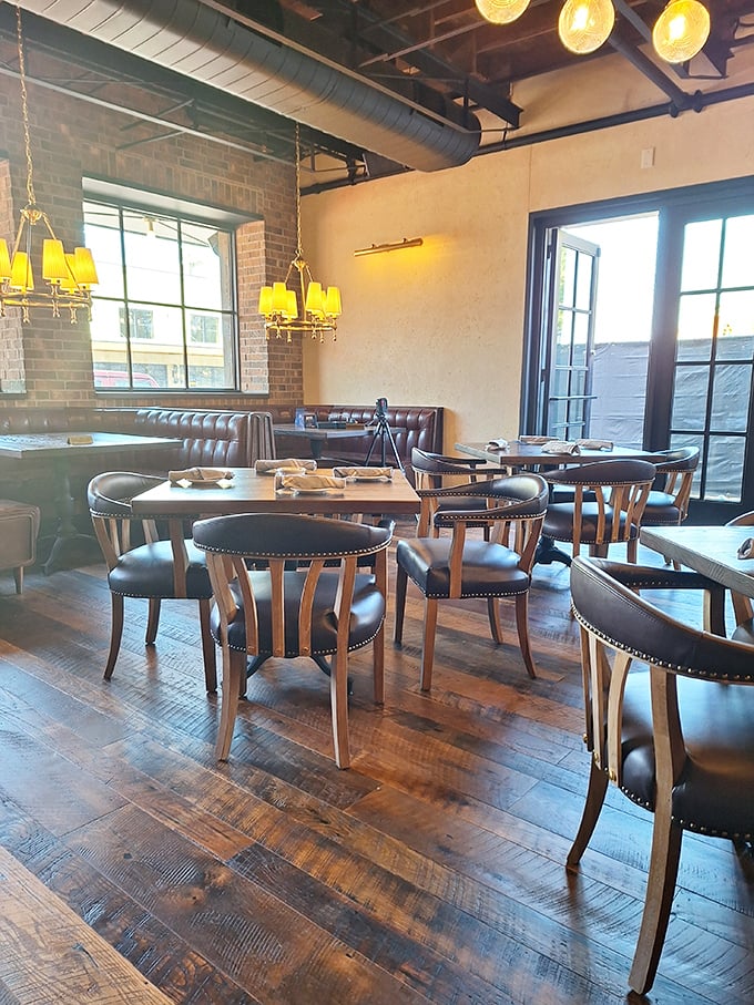 Modern dining area where the wooden floors have probably heard more business deals and marriage proposals than a Vegas chapel.