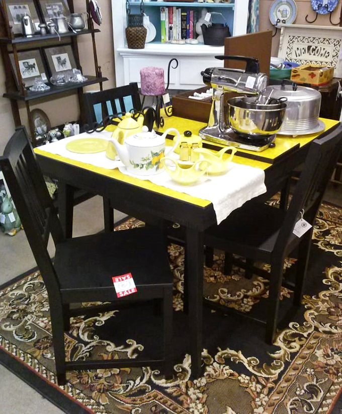 This sunny yellow-accented dining set isn't just furniture&mdash;it's a time machine to Sunday dinners circa 1965, minus the Jell-O salad.