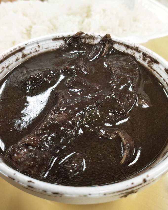 Dinuguan might look mysterious in its rich, dark glory, but this traditional pork stew is the Filipino equivalent of a warm, savory hug. 