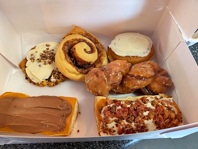 Pastry box paradise! From cinnamon rolls to frosted delights, this collection of treats isn't just breakfast&mdash;it's motivation to accomplish great things before noon.