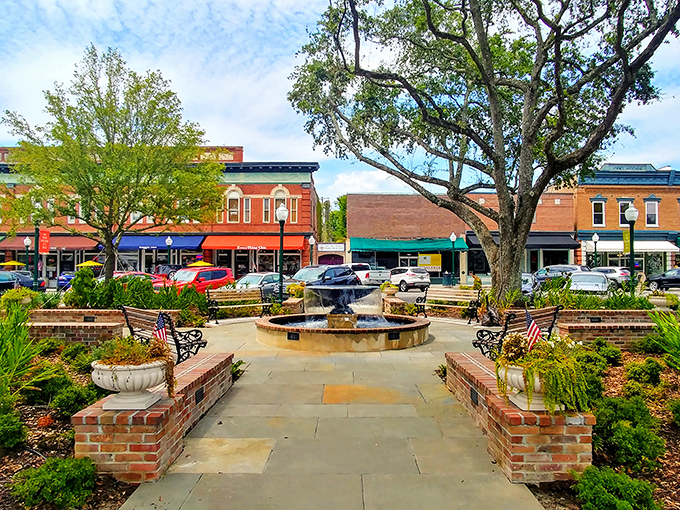 The town square fountain creates a soothing soundtrack for downtown shoppers – nature's muzak that actually improves your shopping experience.