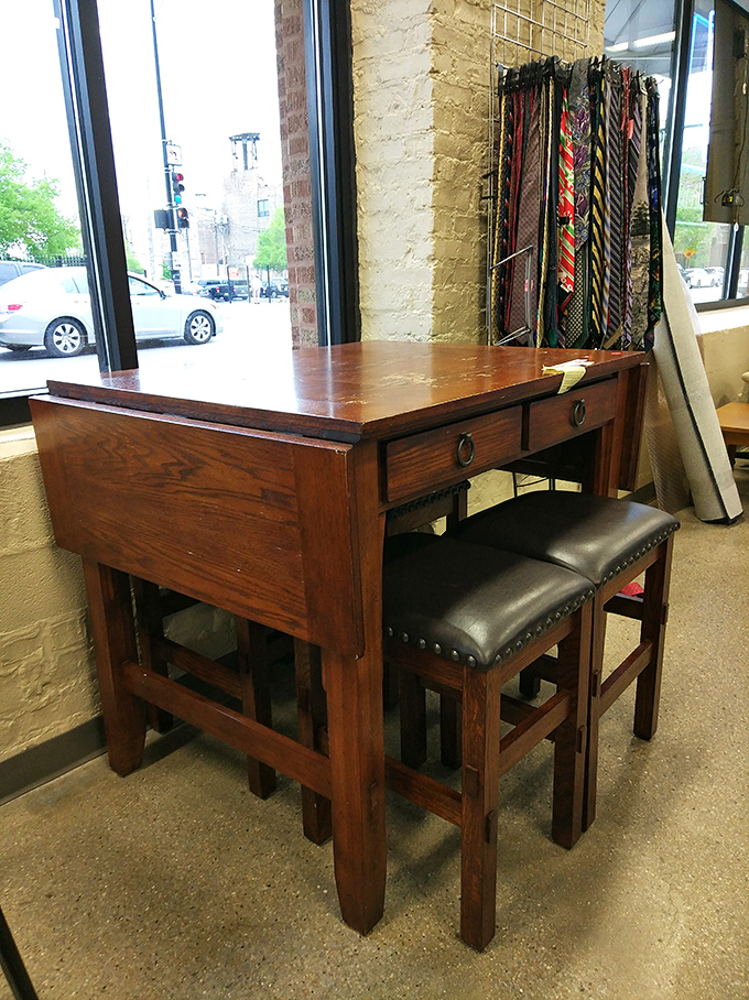 This drop-leaf table isn't just furniture; it's a conversation piece with character that Restoration Hardware would charge you a mortgage payment for.