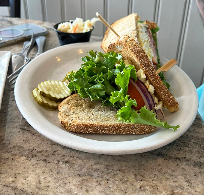 This sandwich isn't trying to win a beauty pageant, but with fresh greens and hearty bread, it's winning the lunch game hands down.