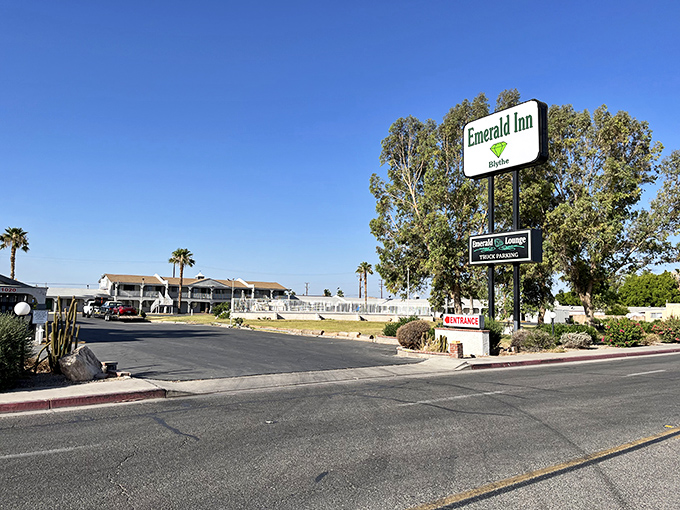 The Emerald Inn offers budget-friendly accommodations for Blythe visitors, its vintage sign a reminder that affordable retirement doesn't mean sacrificing comfort.