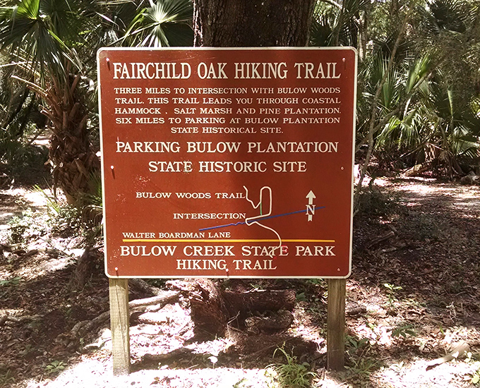 Your roadmap to wilderness wonders. This trail sign outlines the path connecting two remarkable state parks through miles of pristine Florida coastal ecosystem.