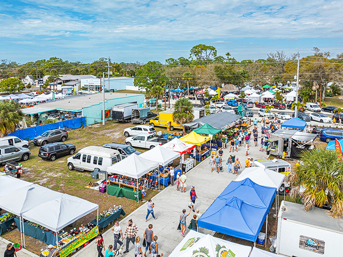 The farmers market – where "shopping local" means chatting with the person who grew your tomatoes while debating which food truck to hit first.