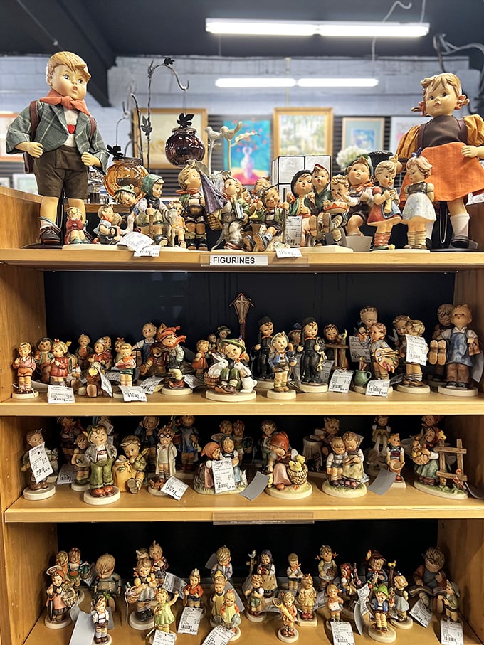 The Hummel army stands at attention. These vintage figurines—once the pride of grandmothers everywhere—await collectors who appreciate their old-school charm.