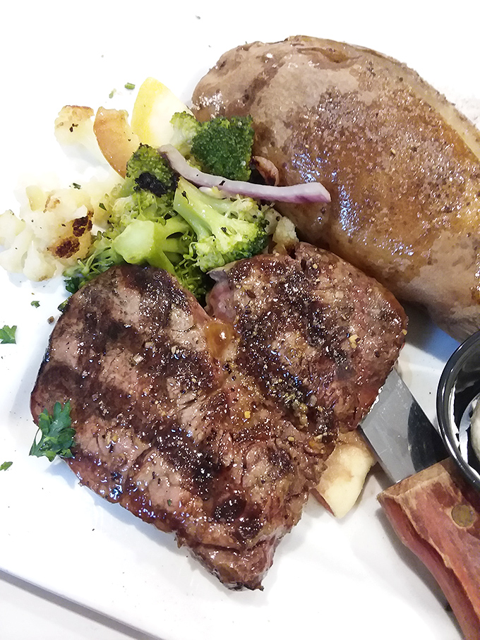 A perfectly cooked steak that would make even the most dedicated vegetarian pause for a moment of carnivorous contemplation.