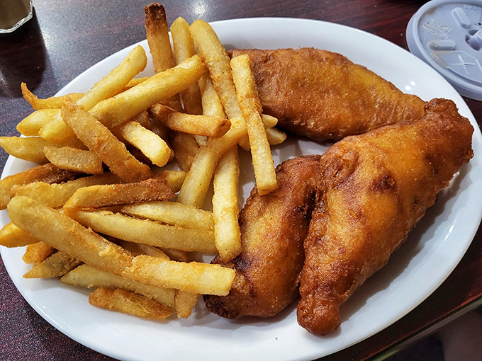 Fish and chips that would make a British pub proud. That golden-battered exterior gives way to flaky white fish that practically begs for a splash of malt vinegar.