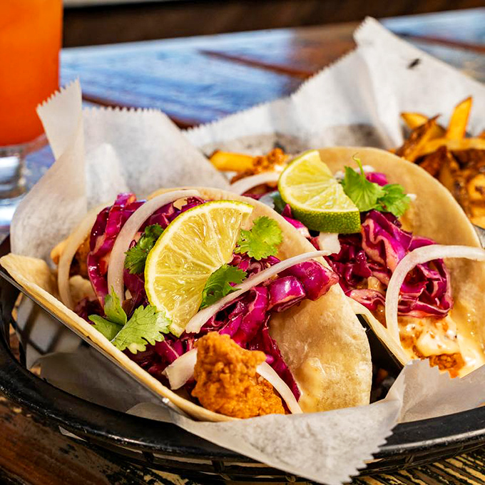Fish tacos dressed with vibrant slaw and lime&mdash;a colorful celebration that brings the beach to your taste buds.