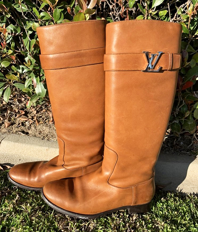 Caramel-colored Louis Vuitton boots standing tall and proud, barely showing their age—like the Helen Mirren of the footwear world.