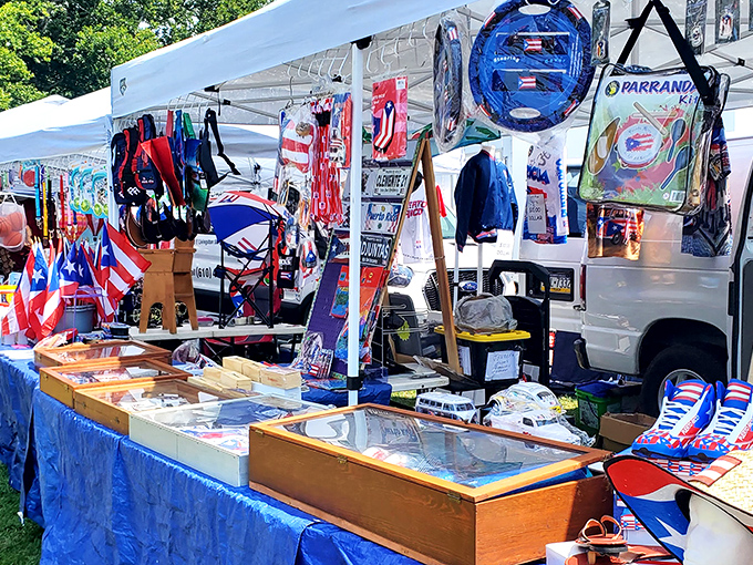 Flag-waving entrepreneurship at its finest! This vendor's patriotic display proves that red, white, and blue merchandise never goes out of style.