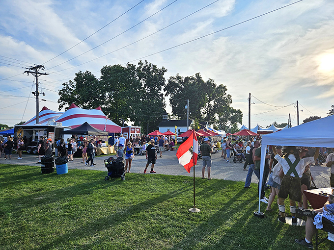 The market stretches into the distance under perfect Wisconsin skies. Tents, flags, and the buzz of haggling create a treasure hunter's paradise.
