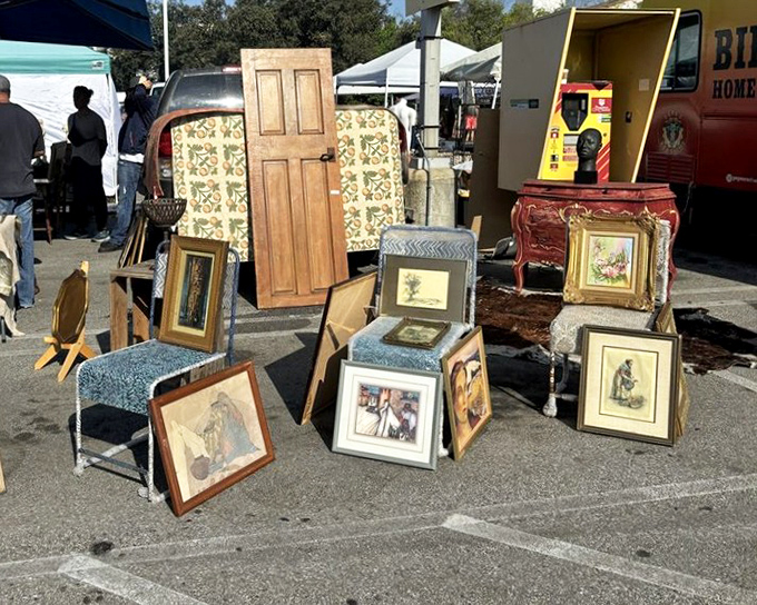 Every picture tells a story, and these frames hold chapters waiting to be continued in someone else's home. That wooden door, though—it's literally an opening to possibilities!
