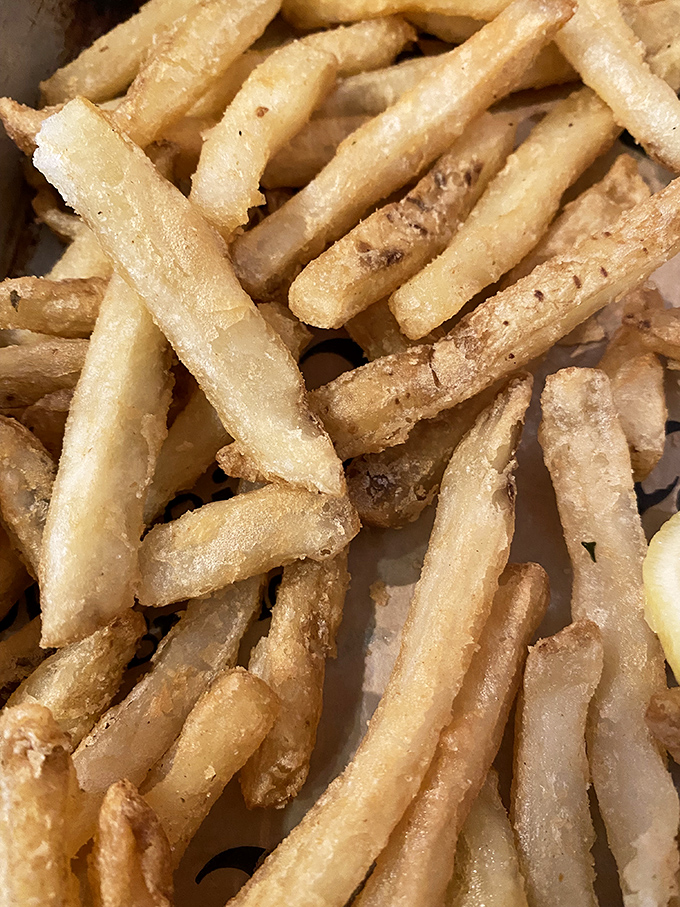 French fries so perfectly golden and crisp, they make you question why you ever considered ordering a salad instead.